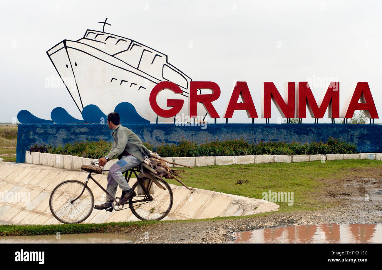BAYAMO, CUBA- MAY 09, 2016:Biker in front of the Granma memorial ...