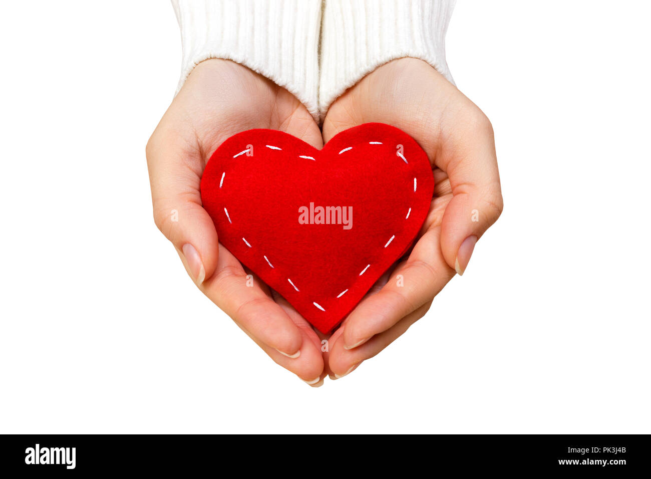 girl hands giving red heart top view isolated Stock Photo - Alamy