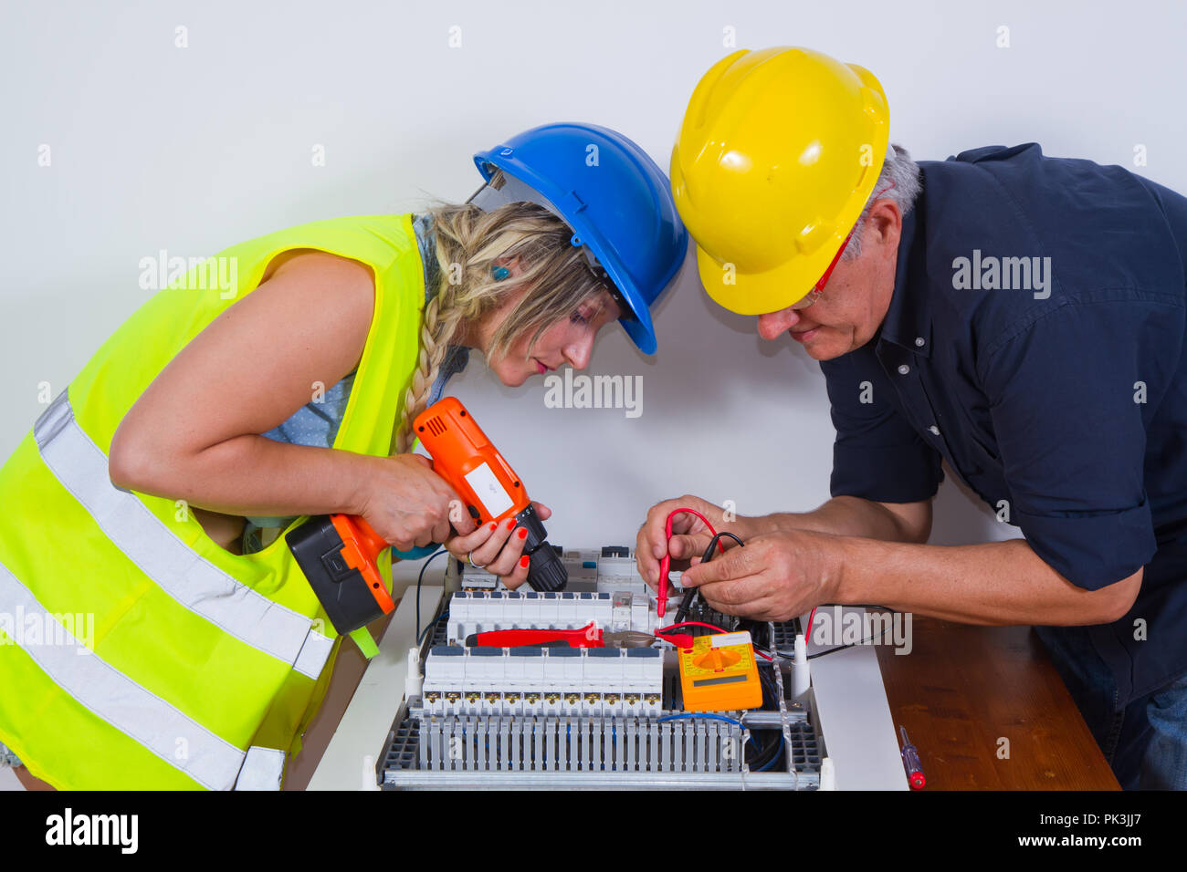 electricians at work in a plant Stock Photo - Alamy