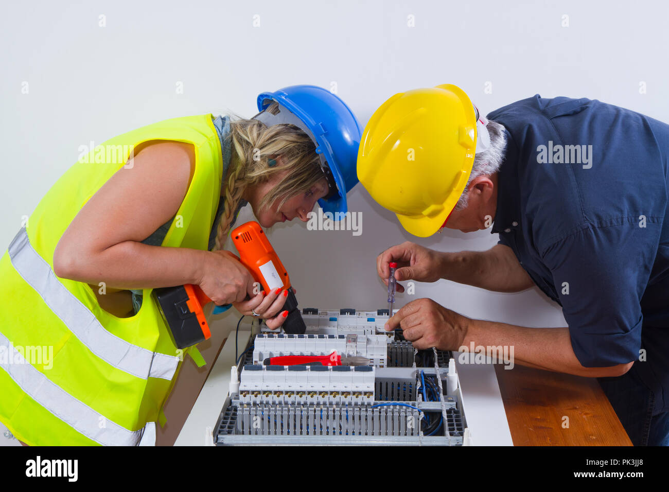 electricians at work in a plant Stock Photo - Alamy