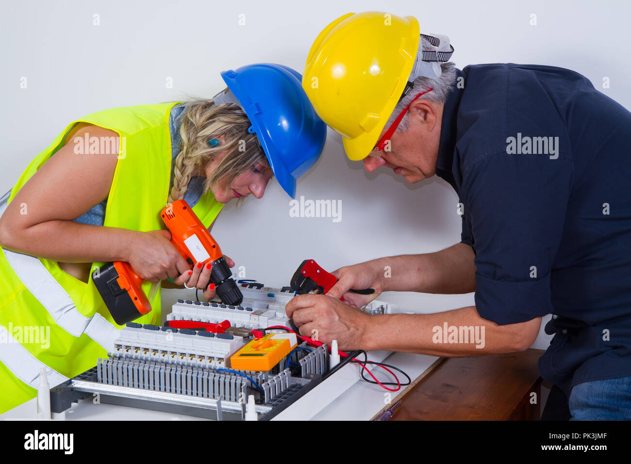 electricians at work in a plant Stock Photo - Alamy