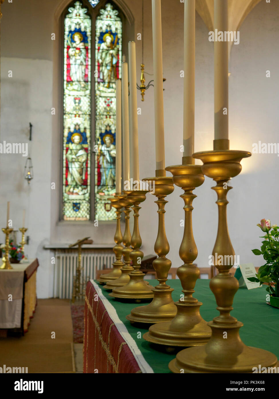 Stained glass church candles uk hi-res stock photography and images - Alamy