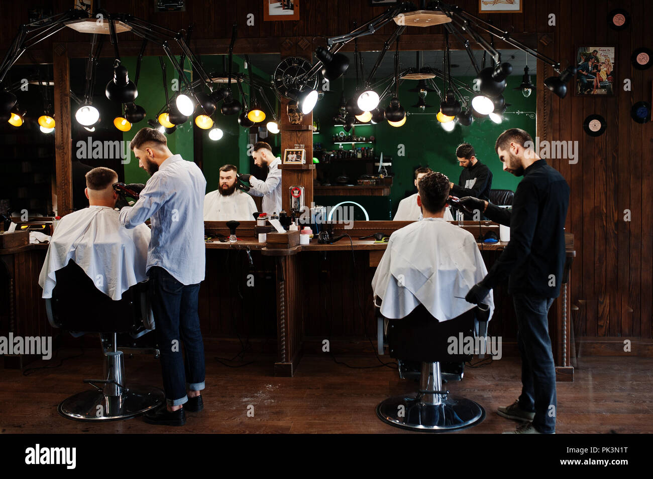 Handsome bearded man at the barbershop, barber at work Stock Photo - Alamy