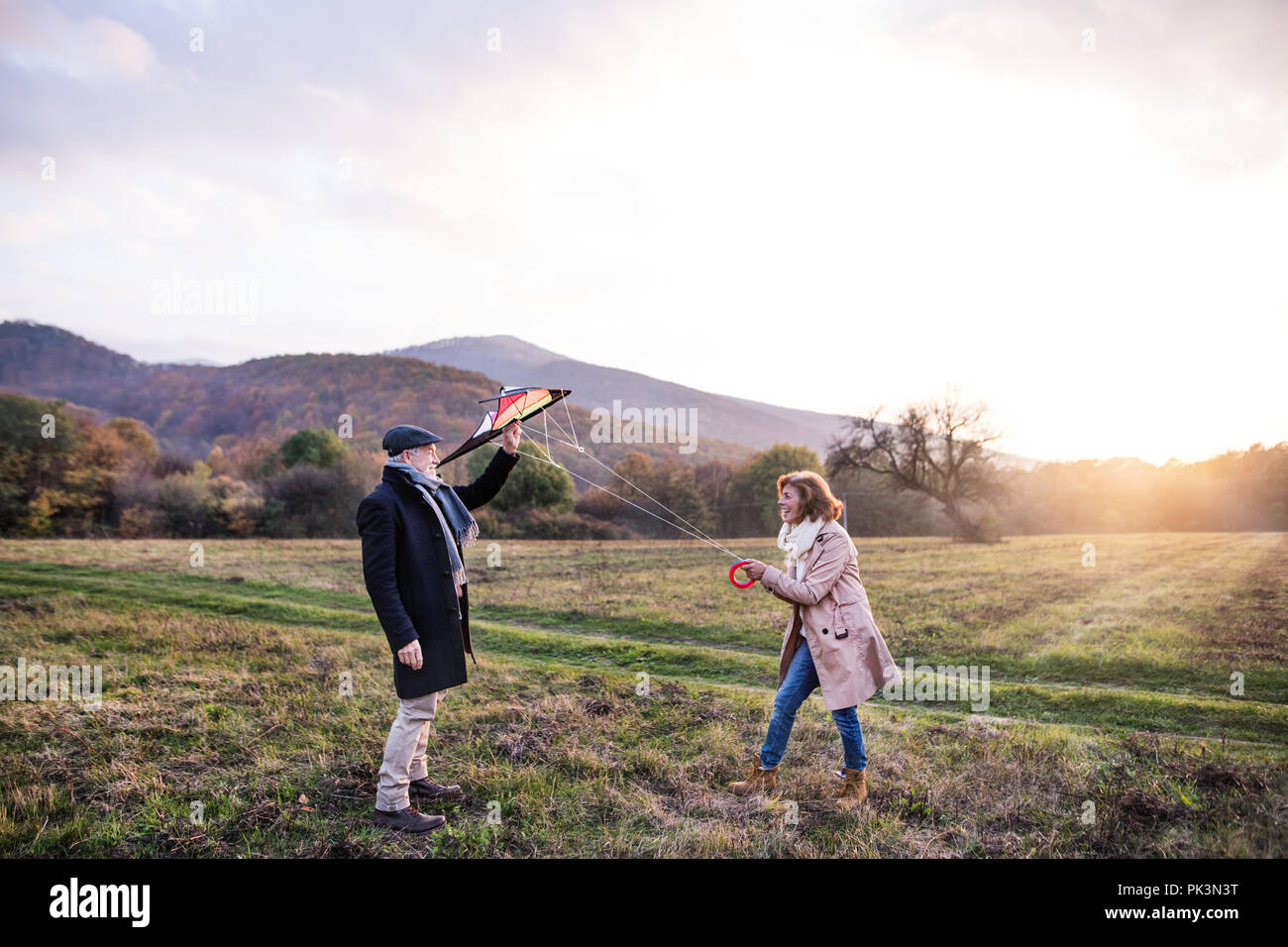 Old people flying kite hi-res stock photography and images - Alamy