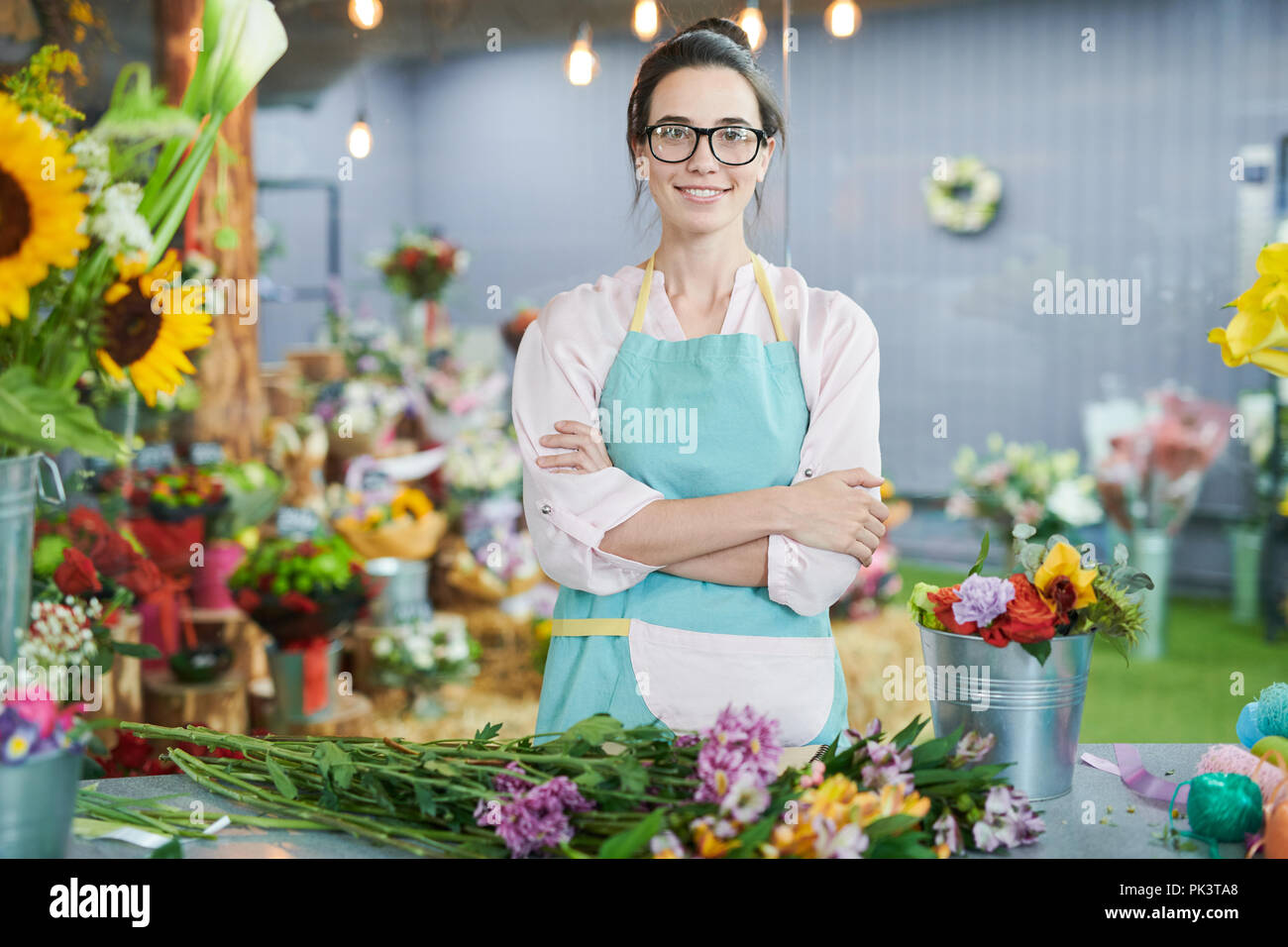 Woman Posing in Flower Shop Stock Photo - Alamy