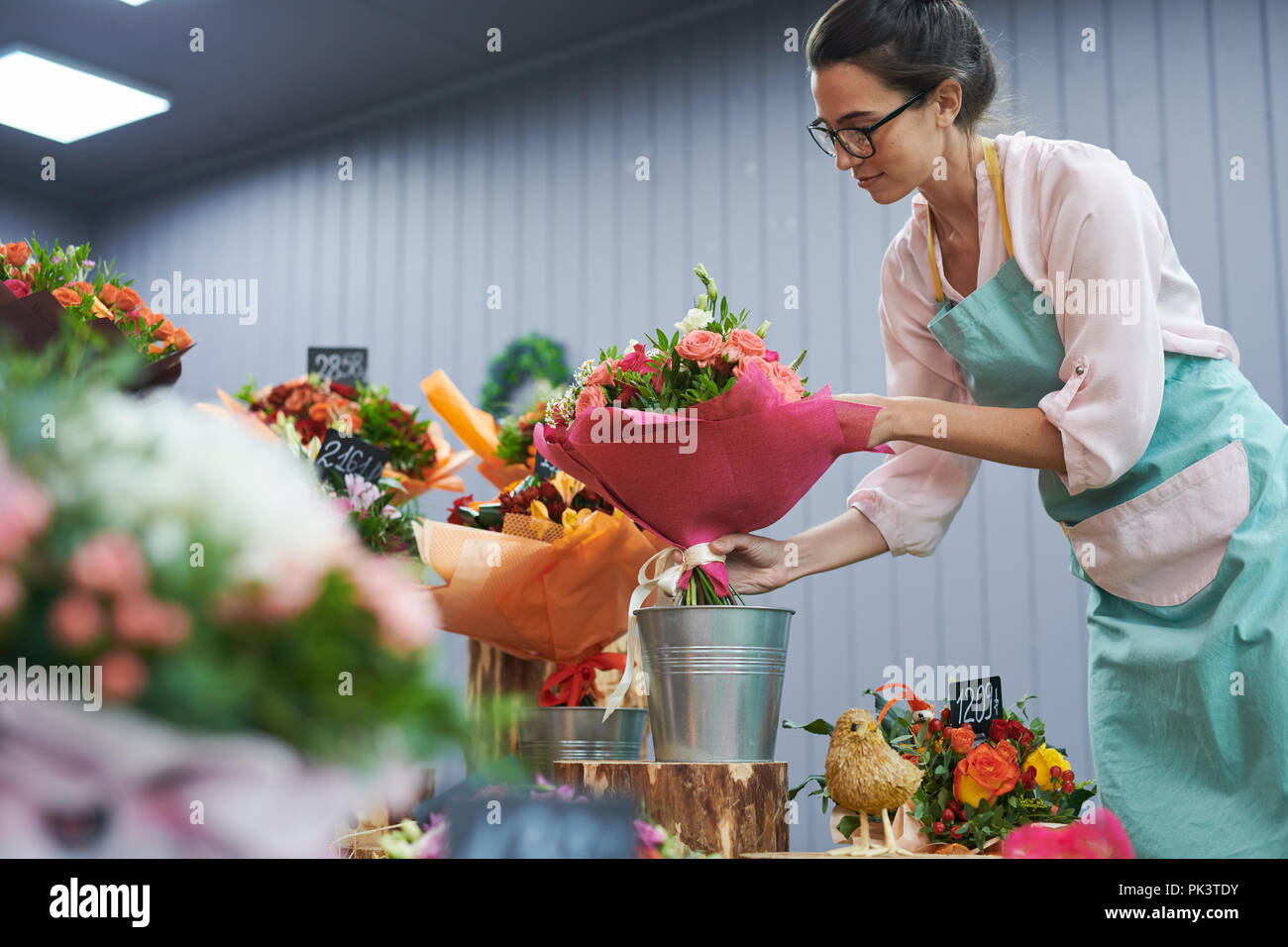 Woman decorator working in floral hi-res stock photography and images ...