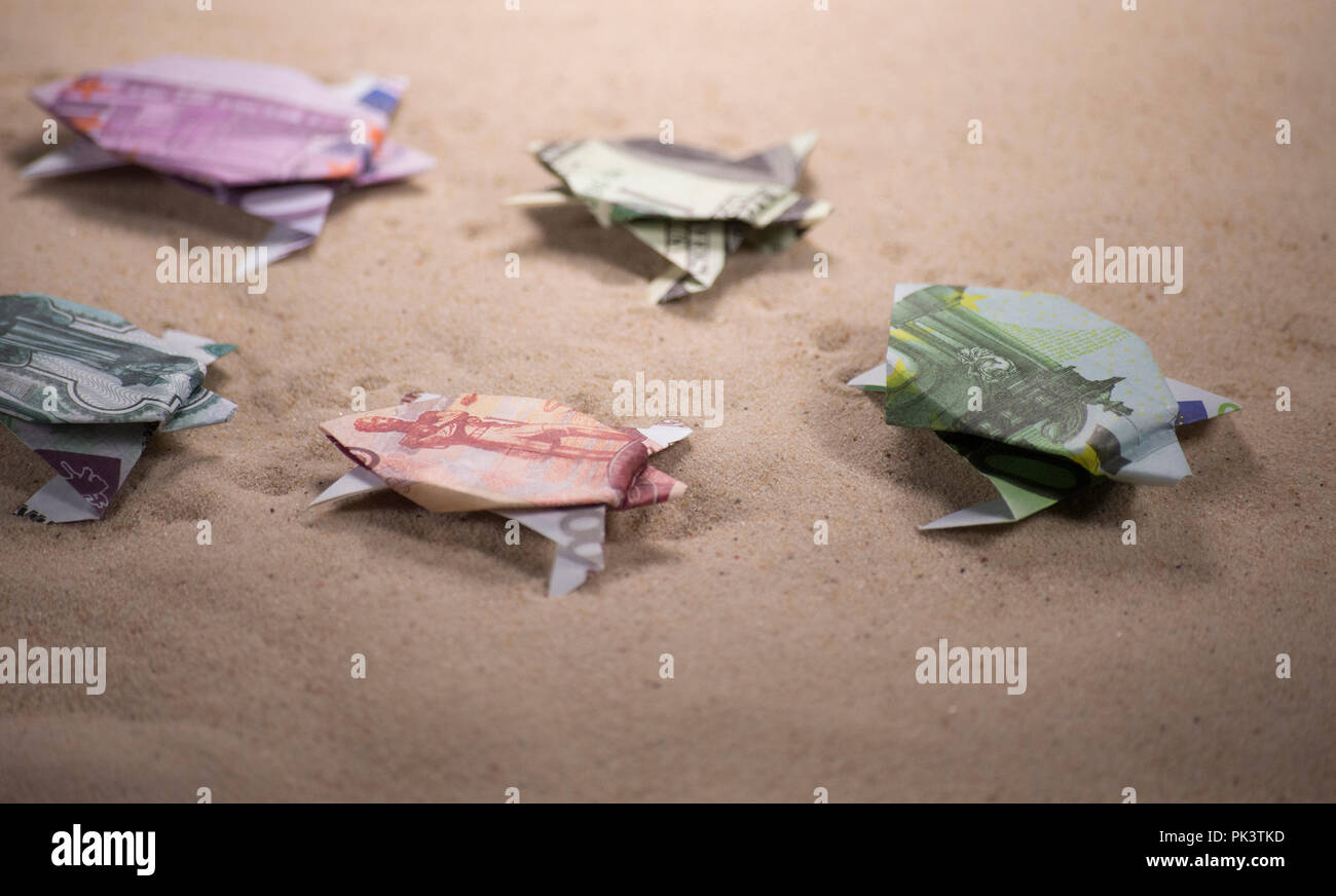 origami turtles from banknotes Stock Photo - Alamy