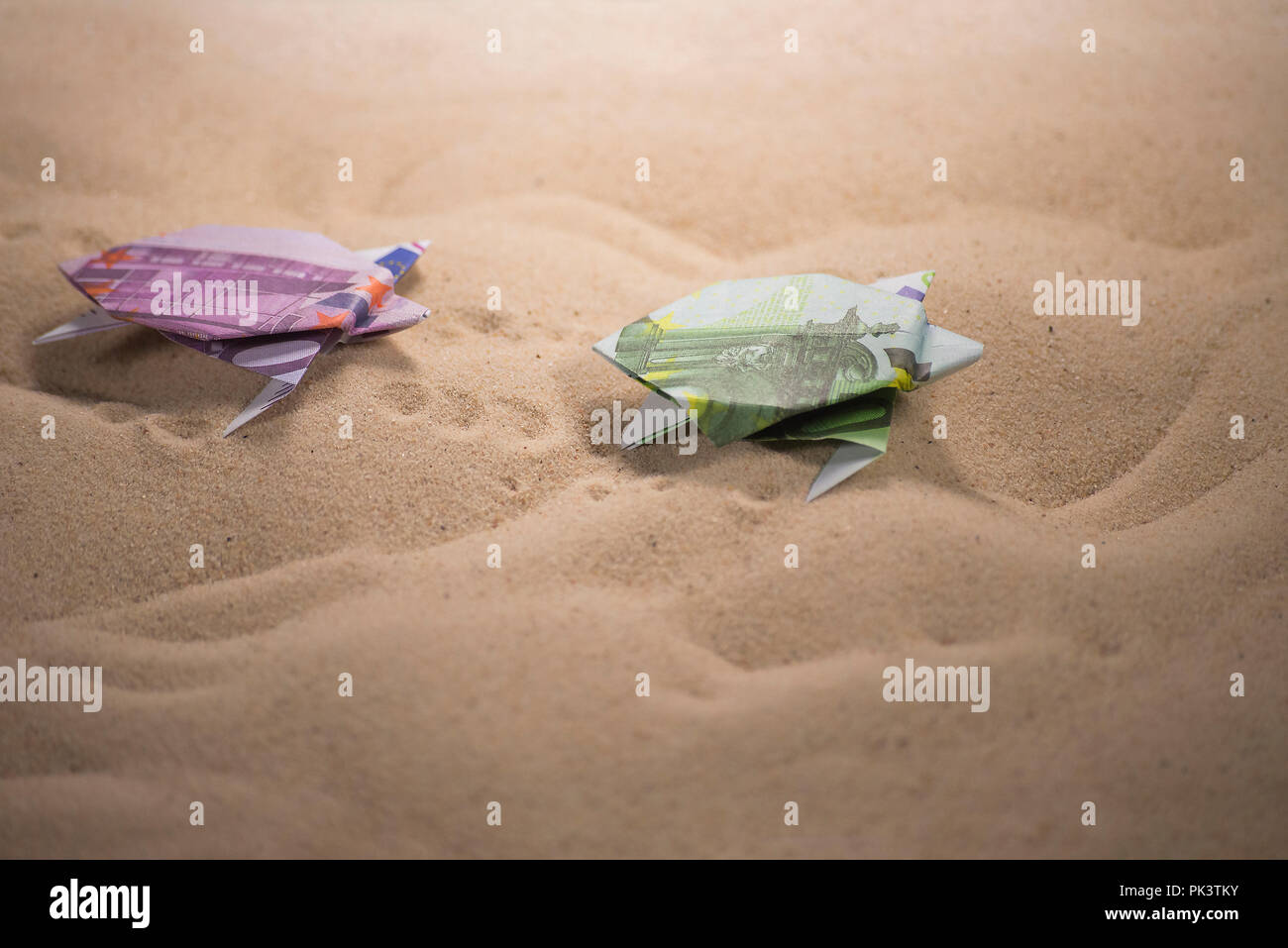 origami turtles from banknotes Stock Photo - Alamy