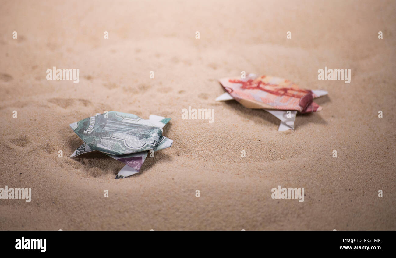 origami turtles from banknotes Stock Photo - Alamy