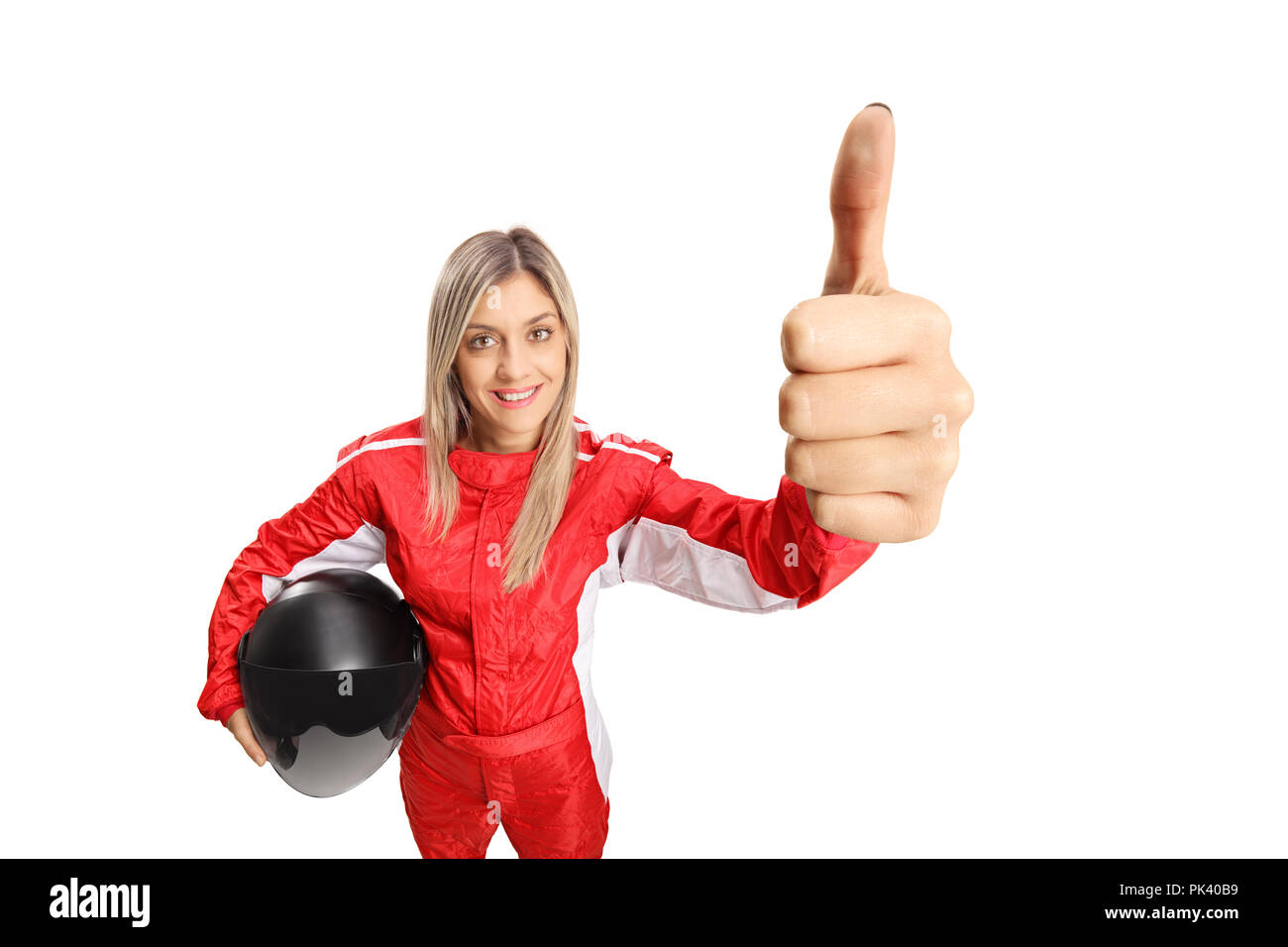 Female racer making a thumb up sign isolated on white background Stock ...