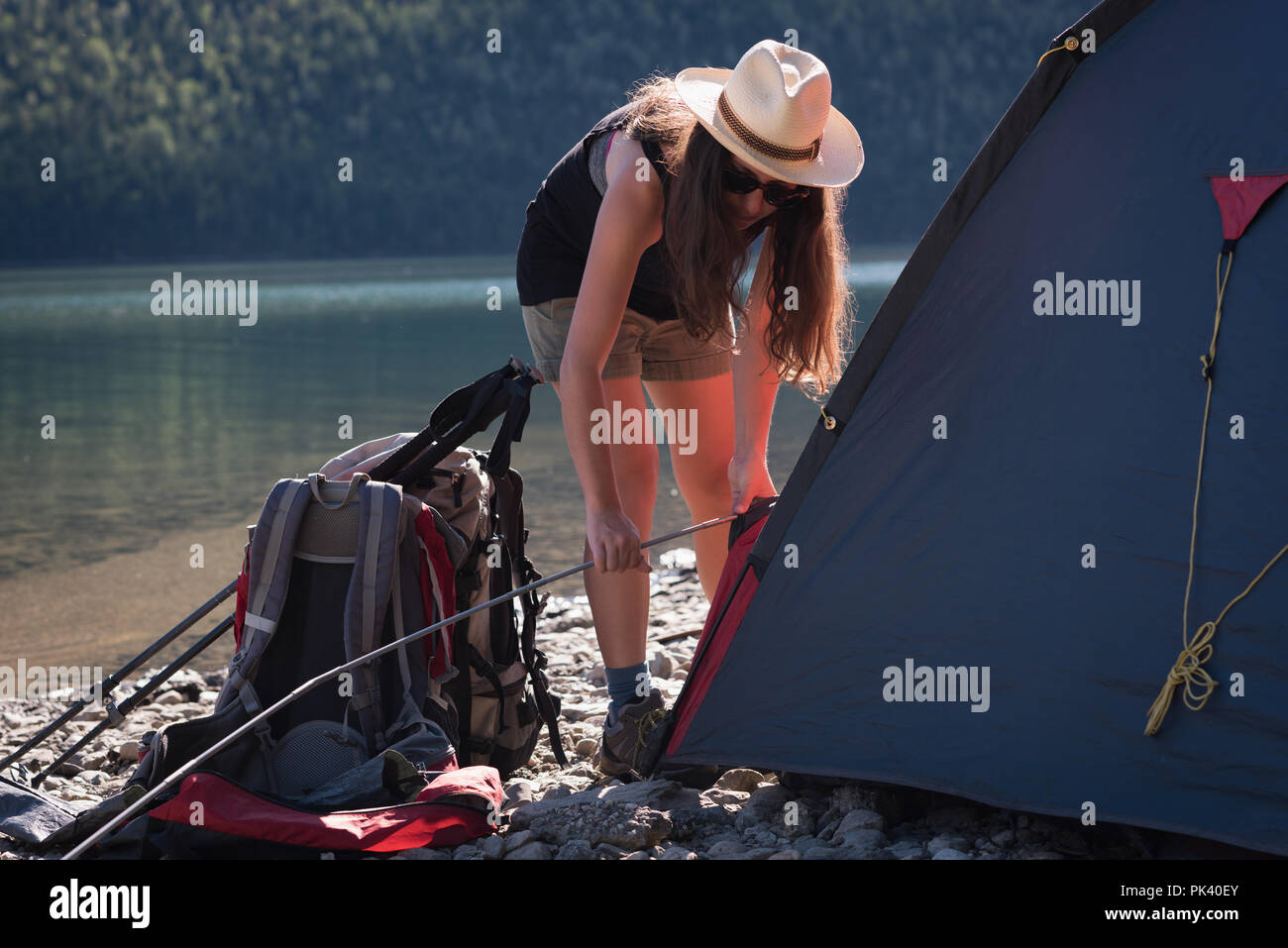 Woman setting up tent Stock Photo - Alamy Woman setting up tent Stock Photo - Alamy
