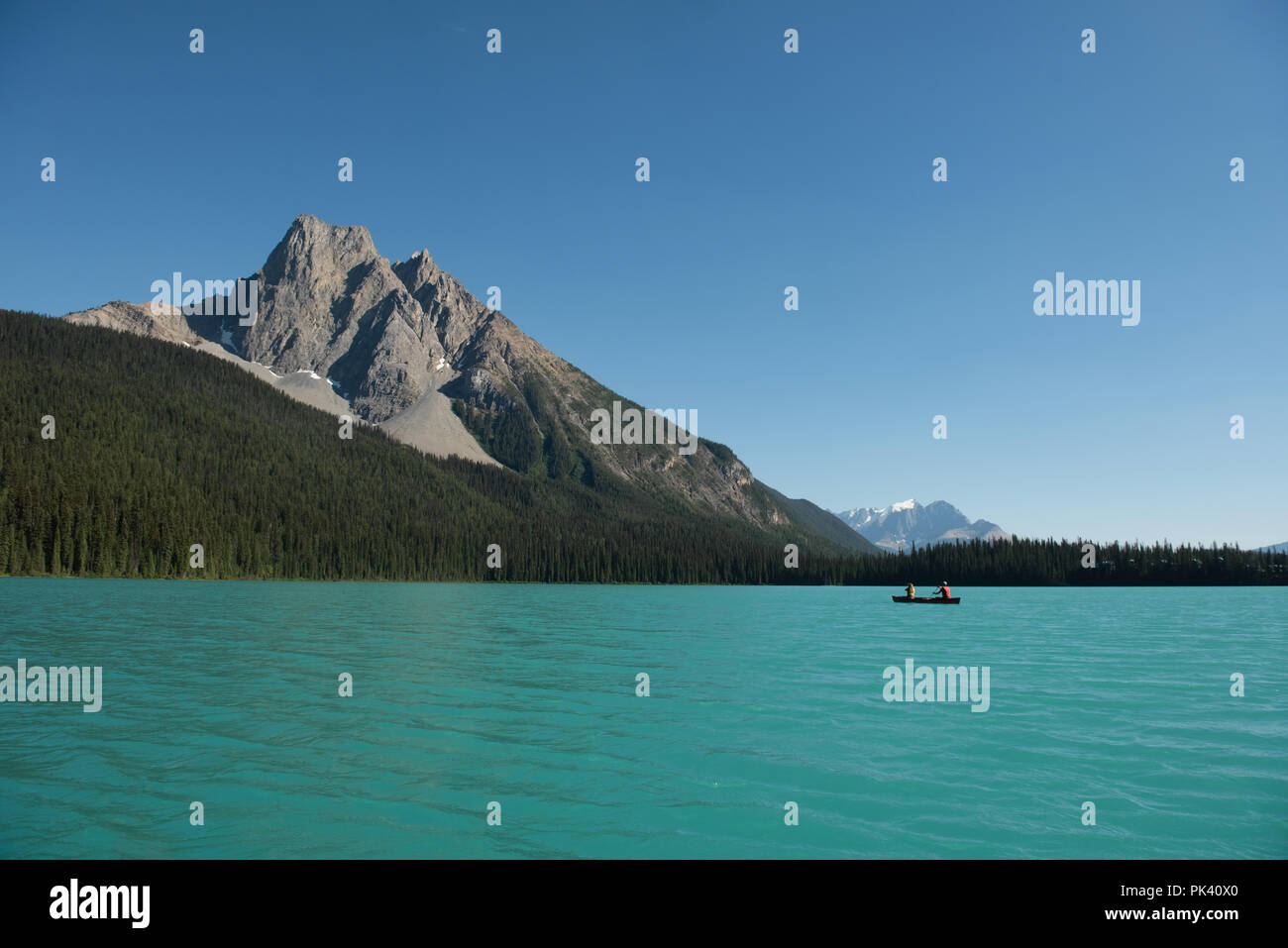 Couple boating on river Stock Photo - Alamy