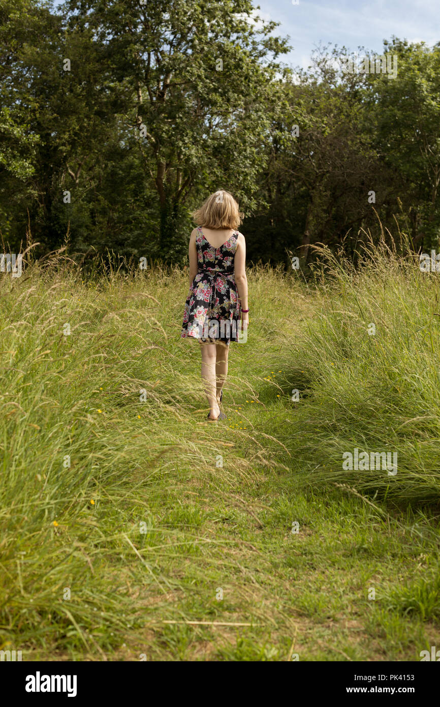 Woman walking farm field hi-res stock photography and images - Alamy