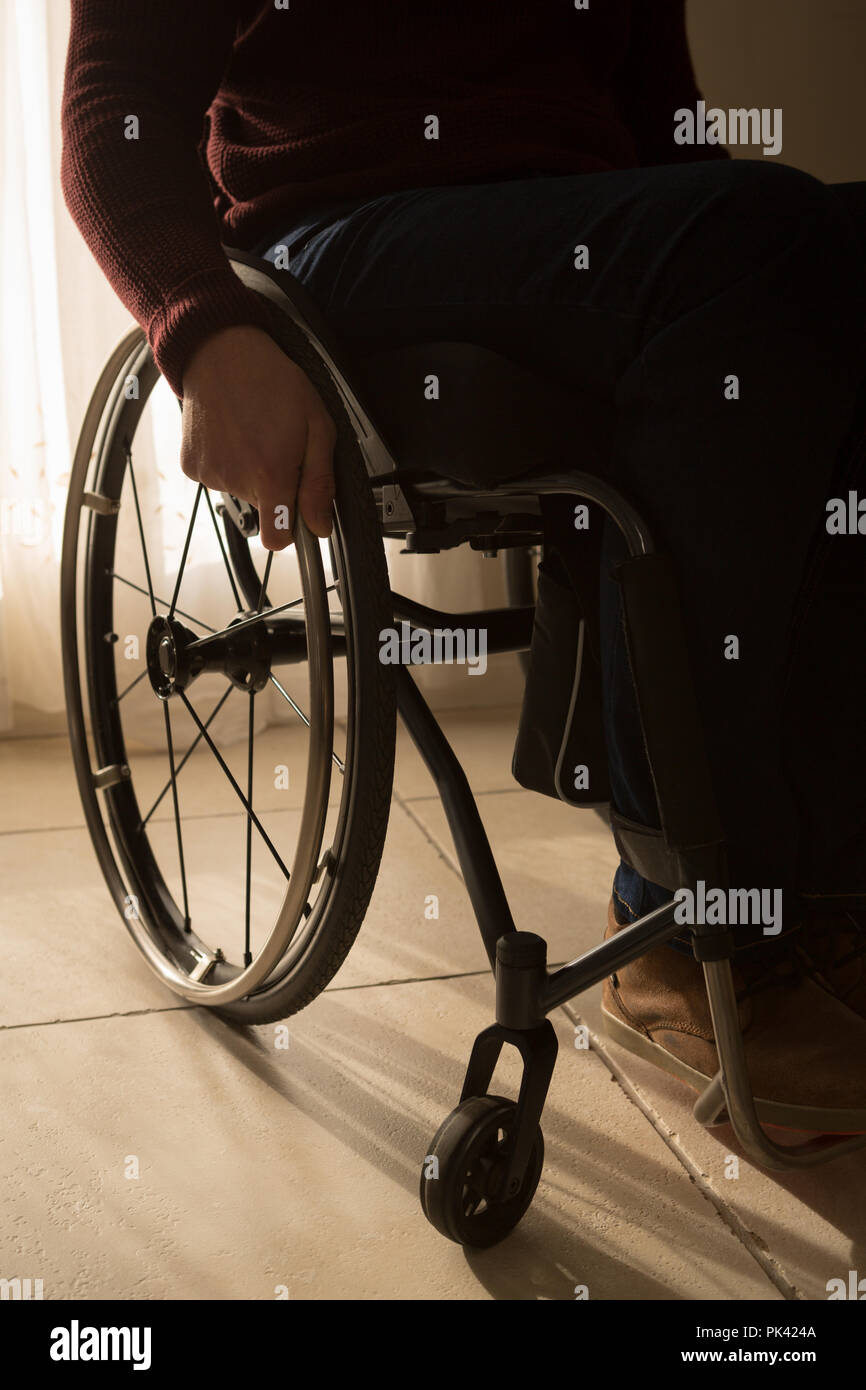 Disabled man in wheelchair hi-res stock photography and images - Alamy