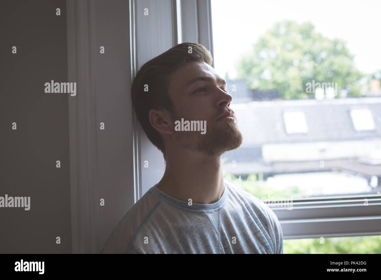 Man at home sad hi-res stock photography and images - Alamy