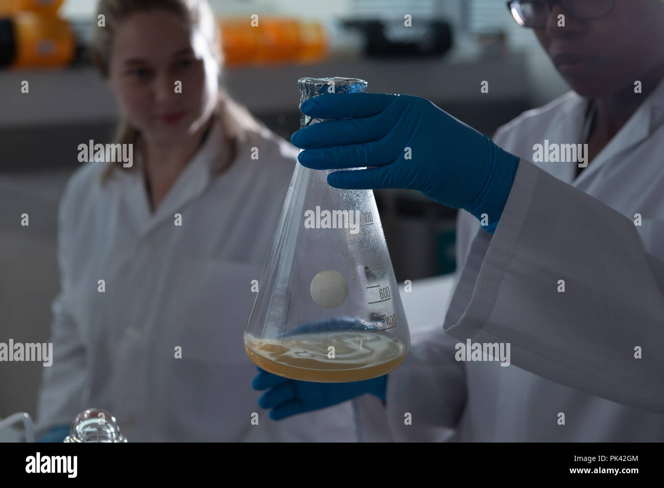 Close up scientists working in hi-res stock photography and images - Alamy