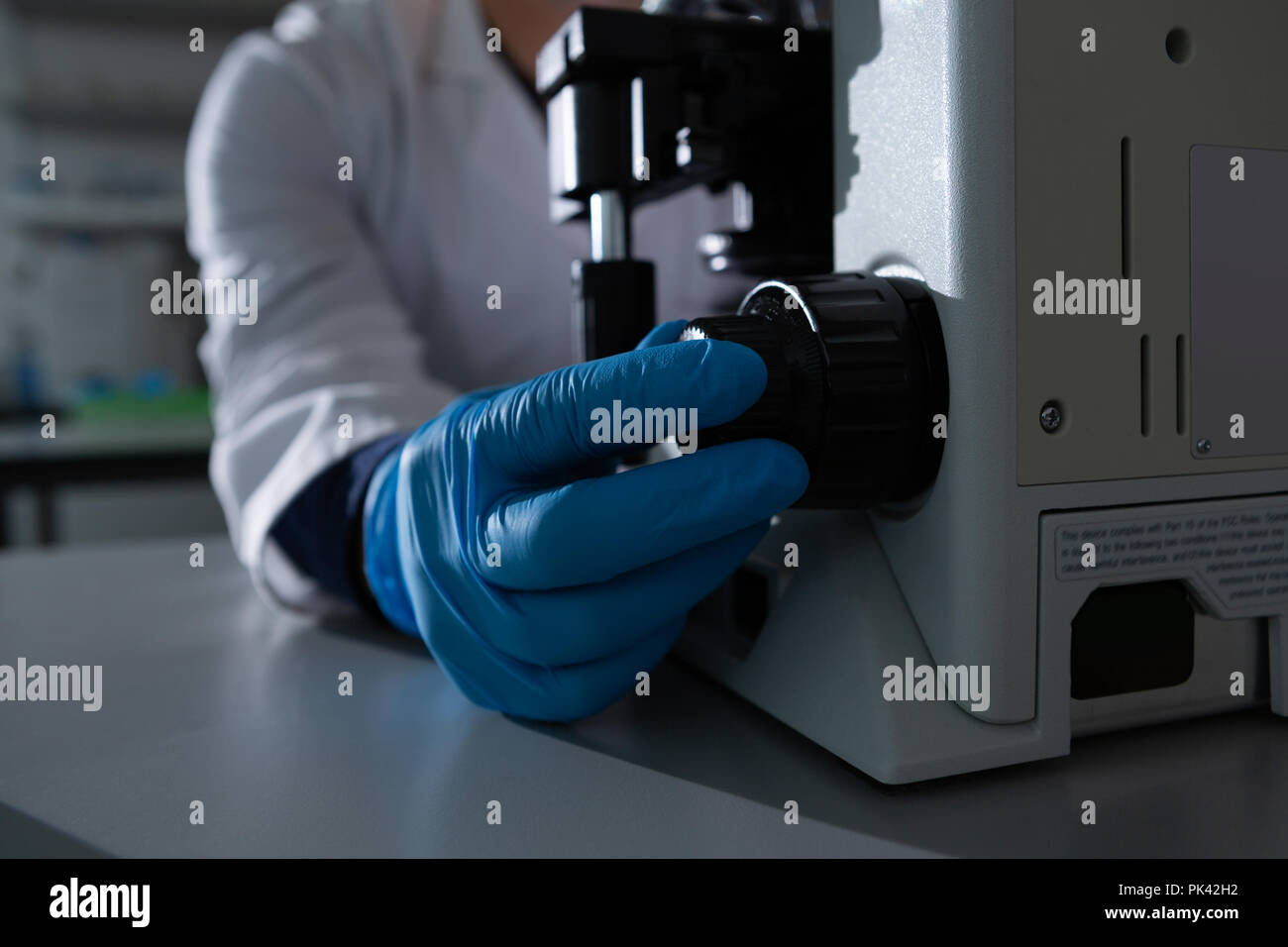 Male scientist microscope laboratory hi-res stock photography and ...