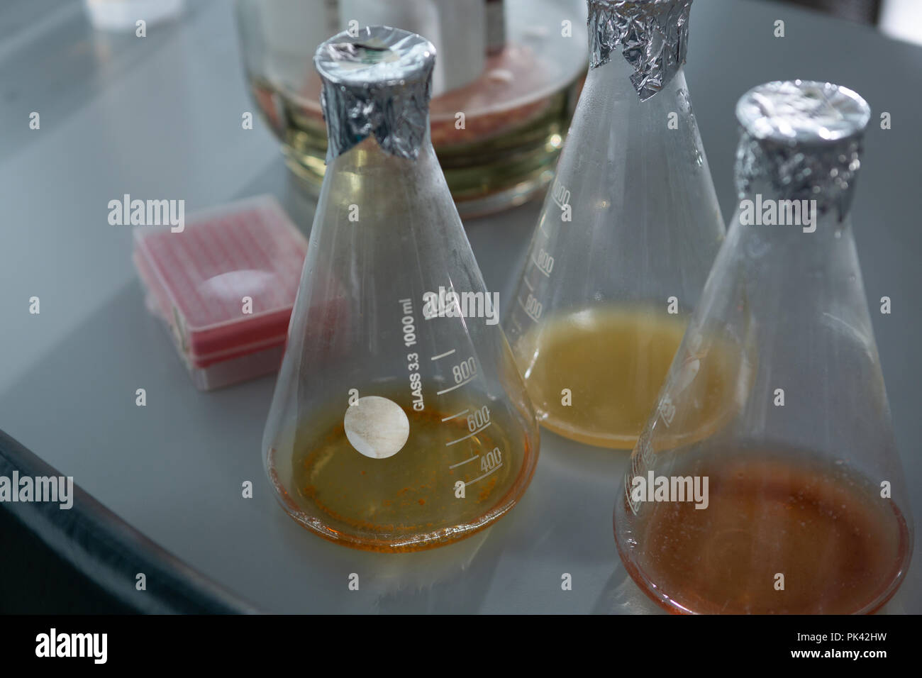 Flask with chemical in laboratory Stock Photo - Alamy