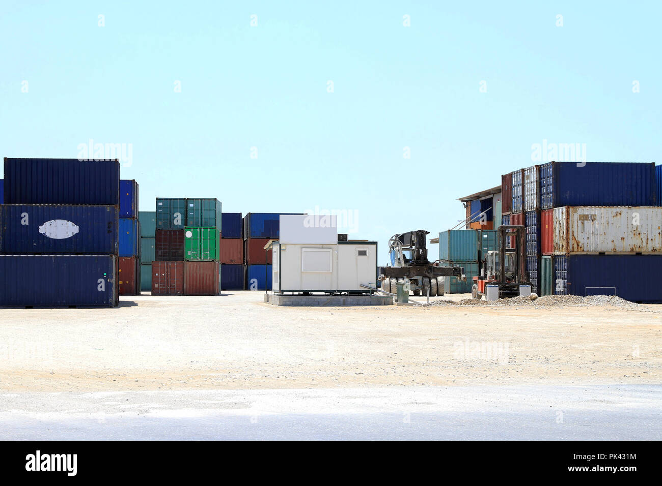 Shipping and cargo containers at distribution centre Stock Photo - Alamy