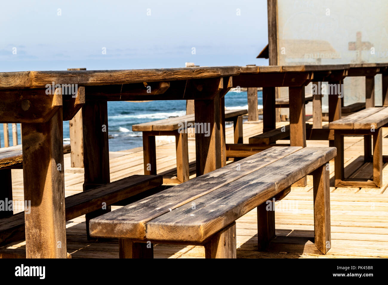 wooden table on the beach Stock Photo - Alamy