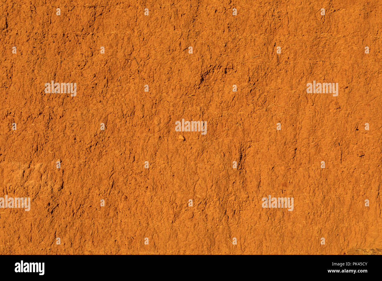 Wall of adobe, earth, mud, straw, pressed. Old, traditional and ...