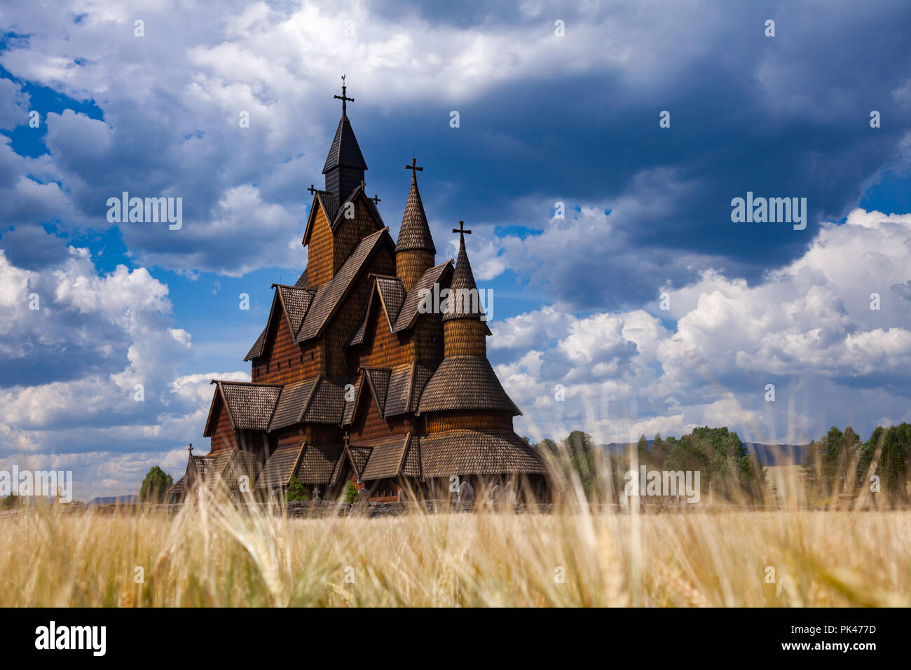 Dramatic sky over the 13th century wooden Heddal Stave Church, the ...
