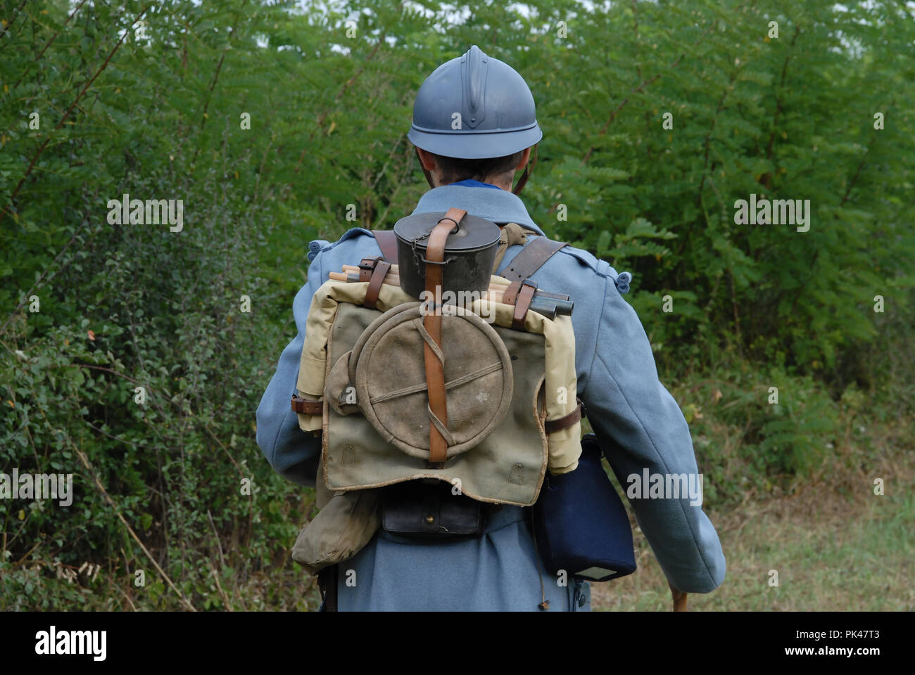 a back view of a 1918 French soldier in the countryside Stock Photo - Alamy