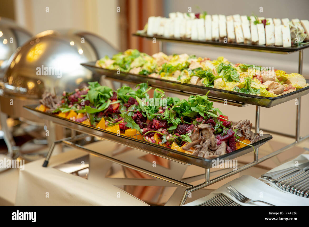 big dishes with salad and meat snack at reception. catering snack Stock ...