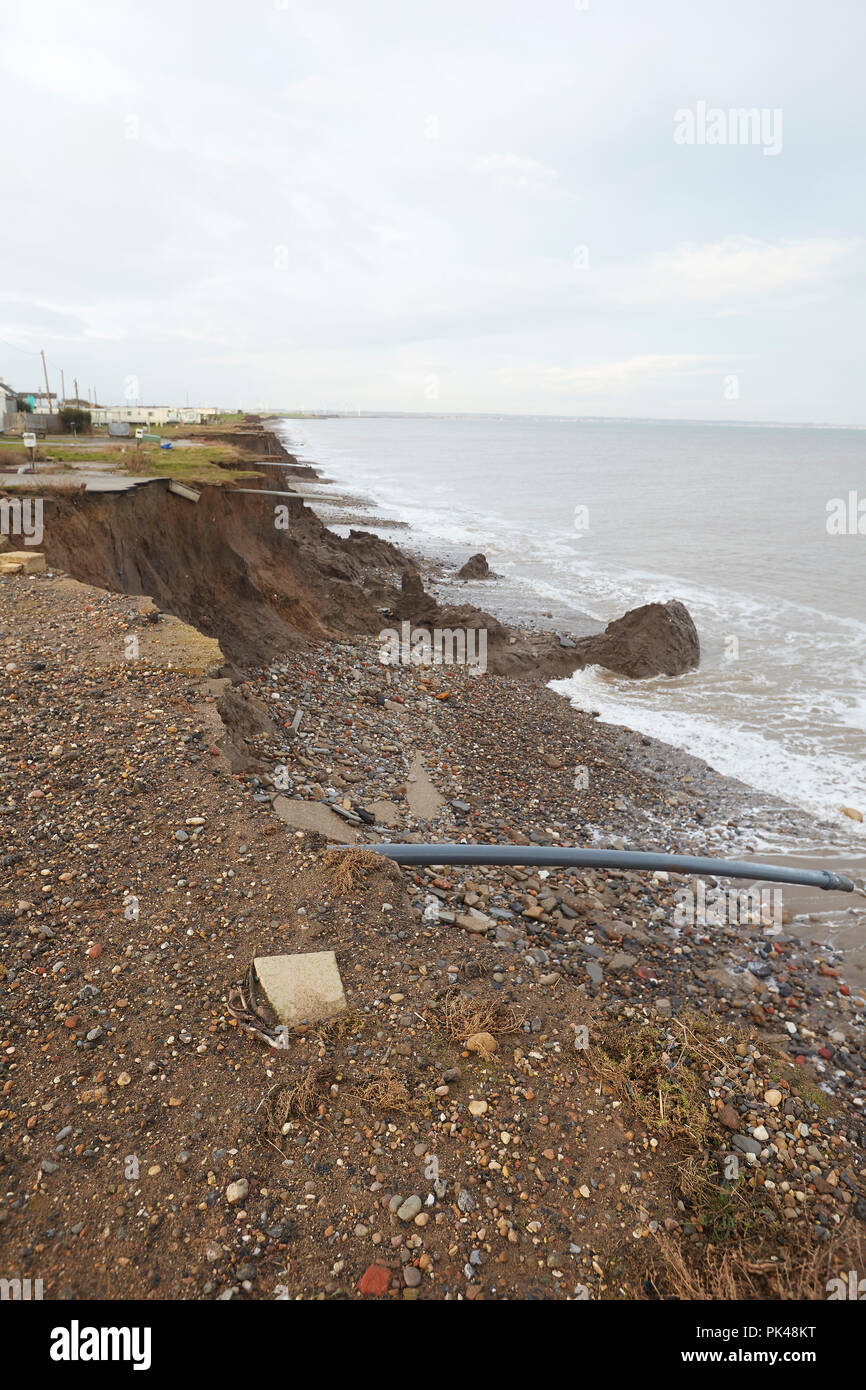 Coastal Erosion cliffs, remains of a caravan site that has collapsed ...
