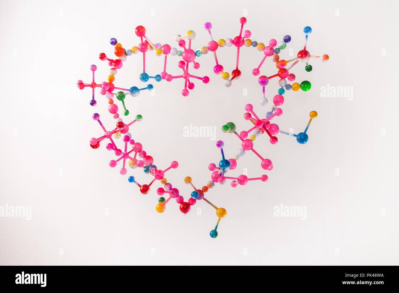 molecular of love with harmony on colors in atom Stock Photo - Alamy