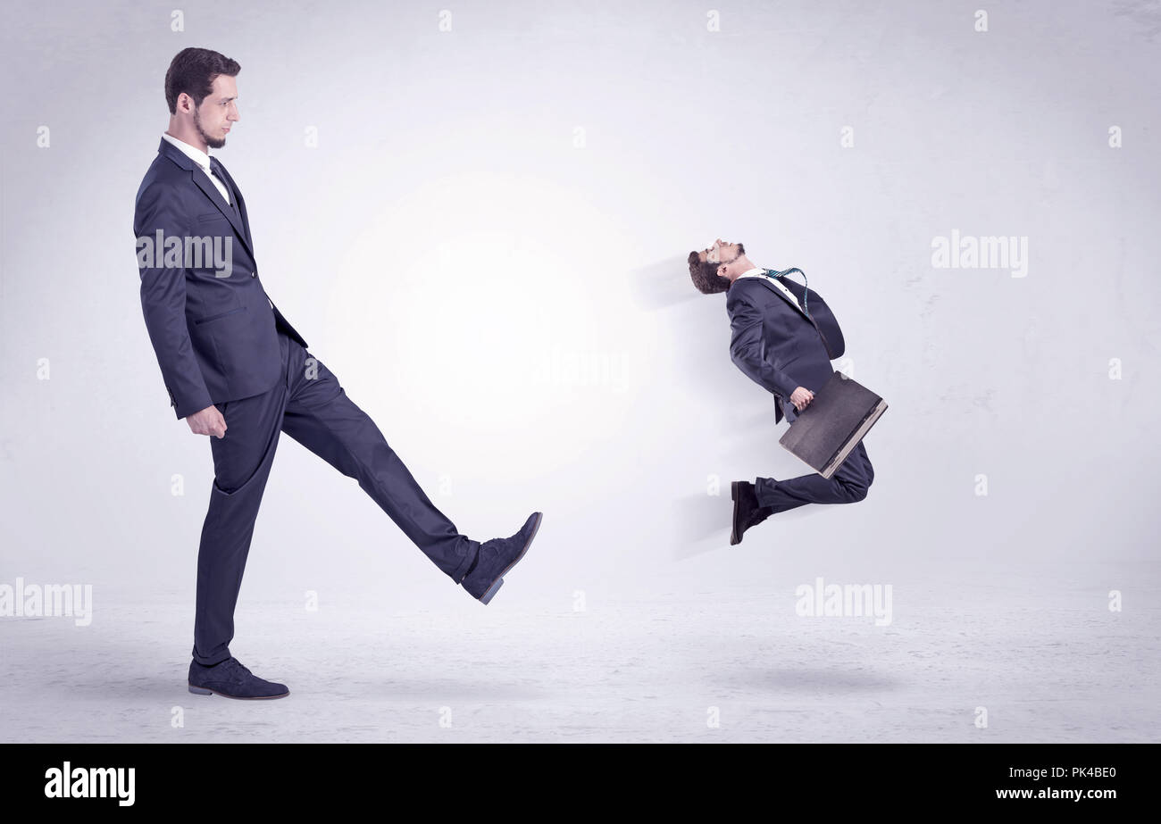Big man in suit kicking out little himself out with simple white ...