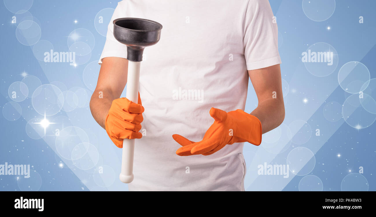 Glittered blue background with male housekeeper and cleaning equipment ...