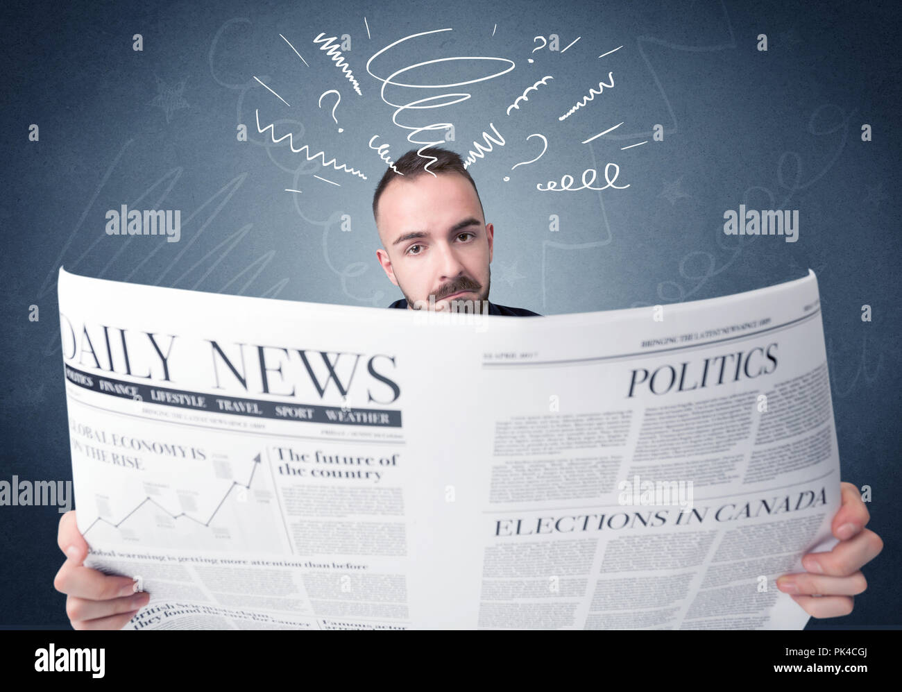Confused businessman holding newspaper c Stock Photo - Alamy