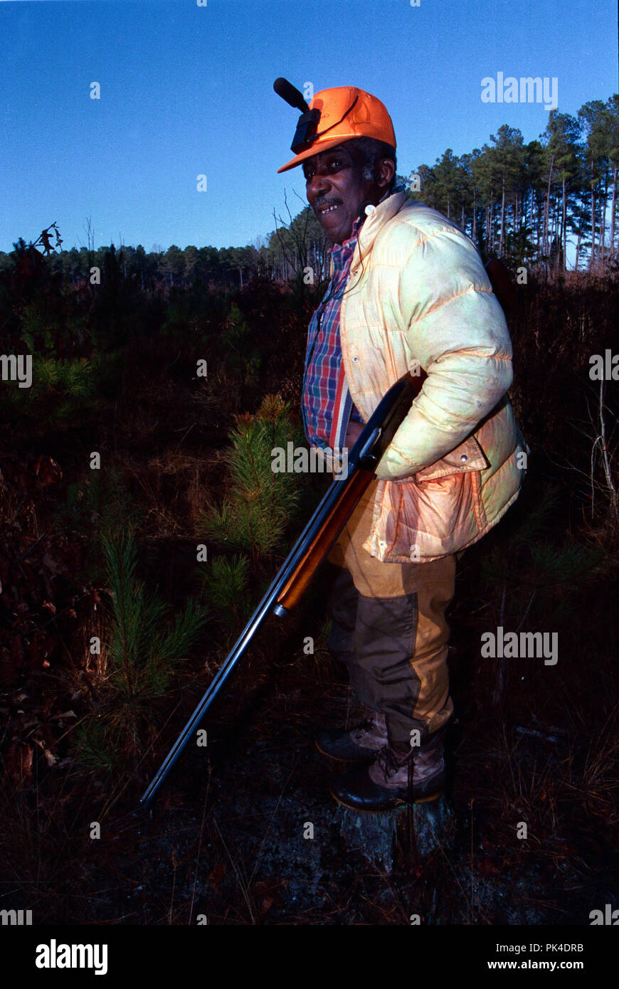 hunting5/021302 -- Rabbit hunters listen to the dogs work into the ...