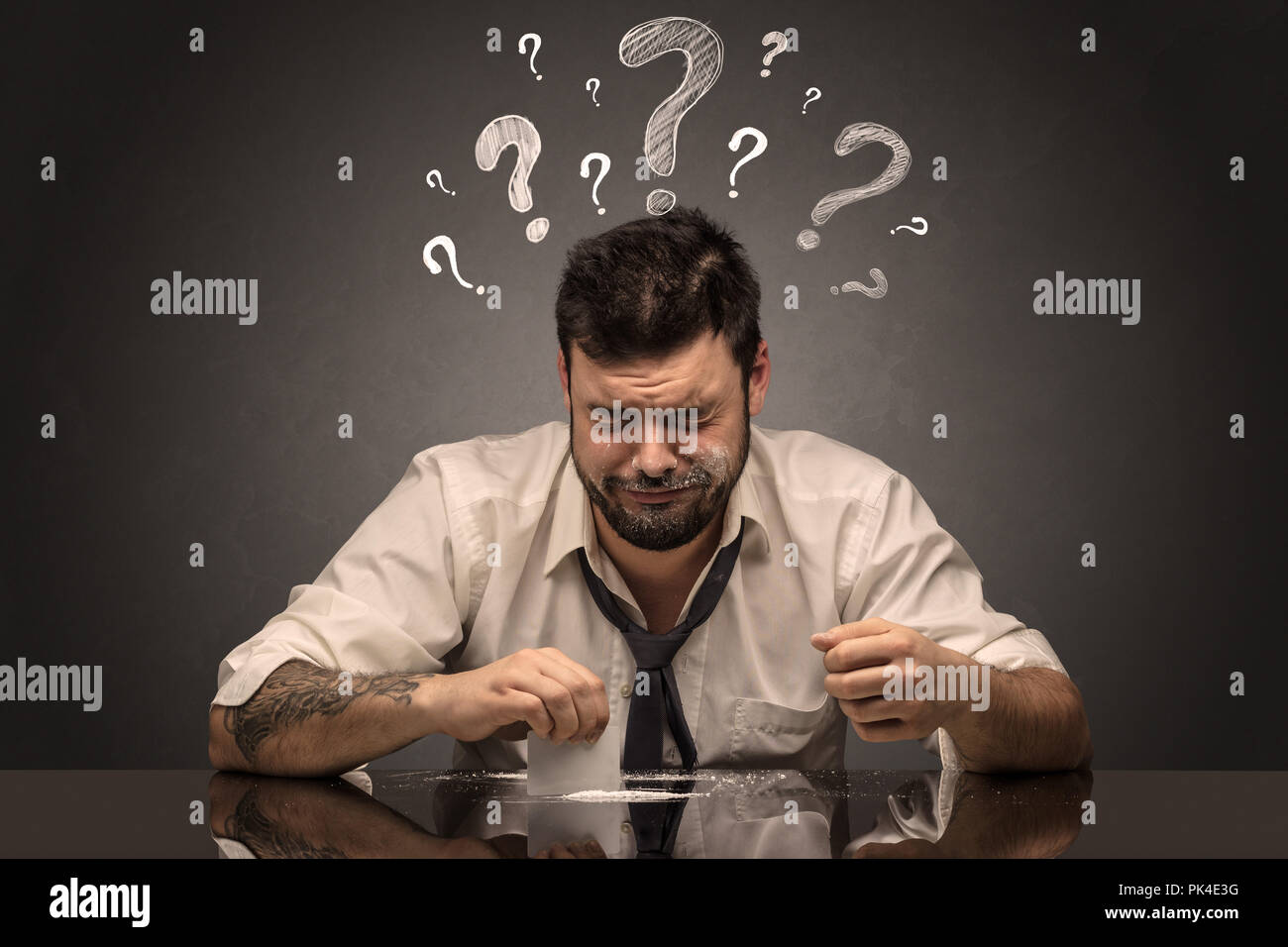 Young drunk disappointed man with question signs concept Stock Photo ... Young drunk disappointed man with question signs concept Stock Photo ...