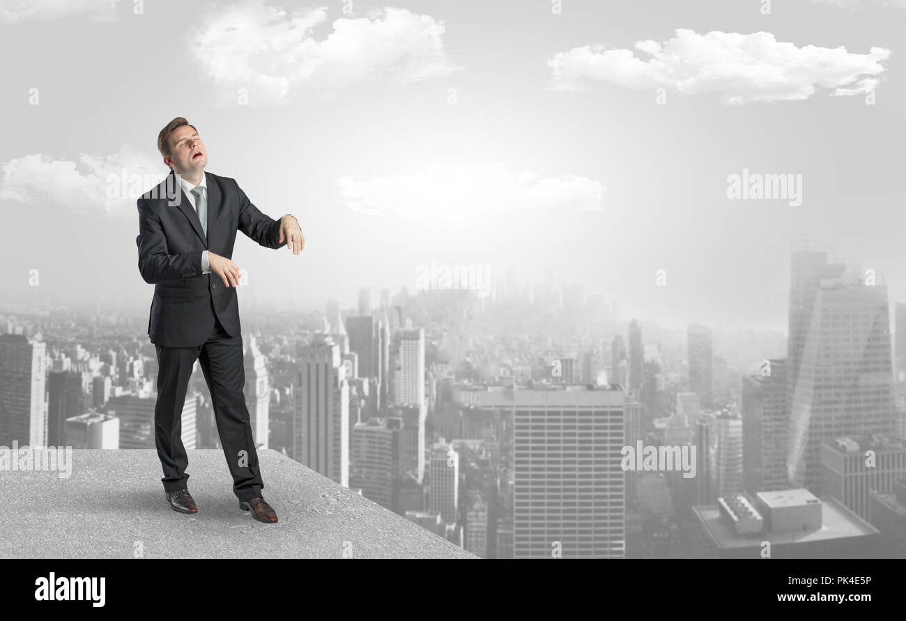 Zombi elegant businessman on the top of the city Stock Photo - Alamy