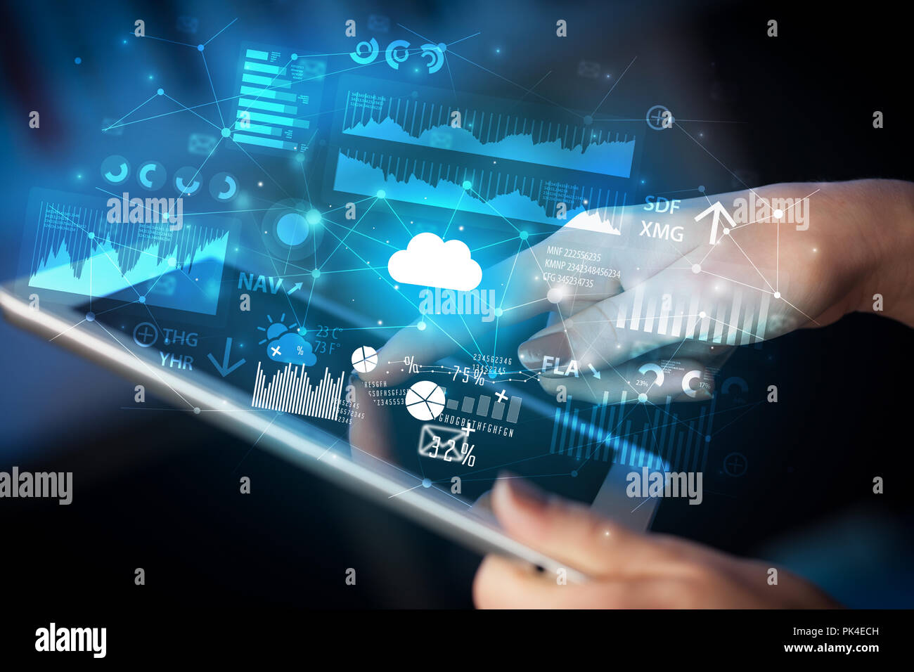 Businessman using tablet with flying application icons around Stock ...