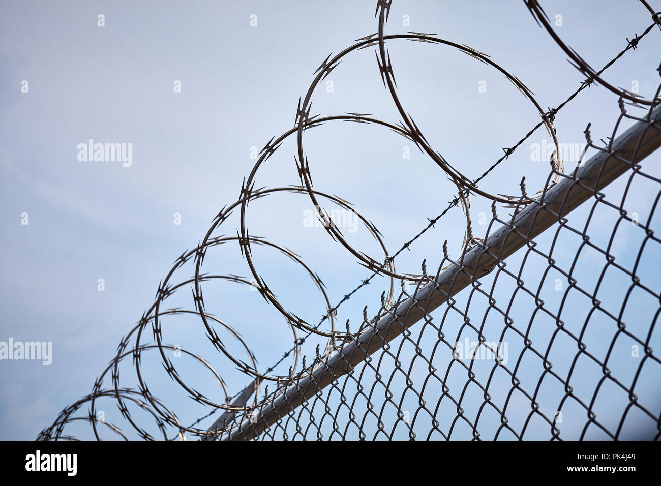 Razor wire barbed wire fence hi-res stock photography and images - Alamy