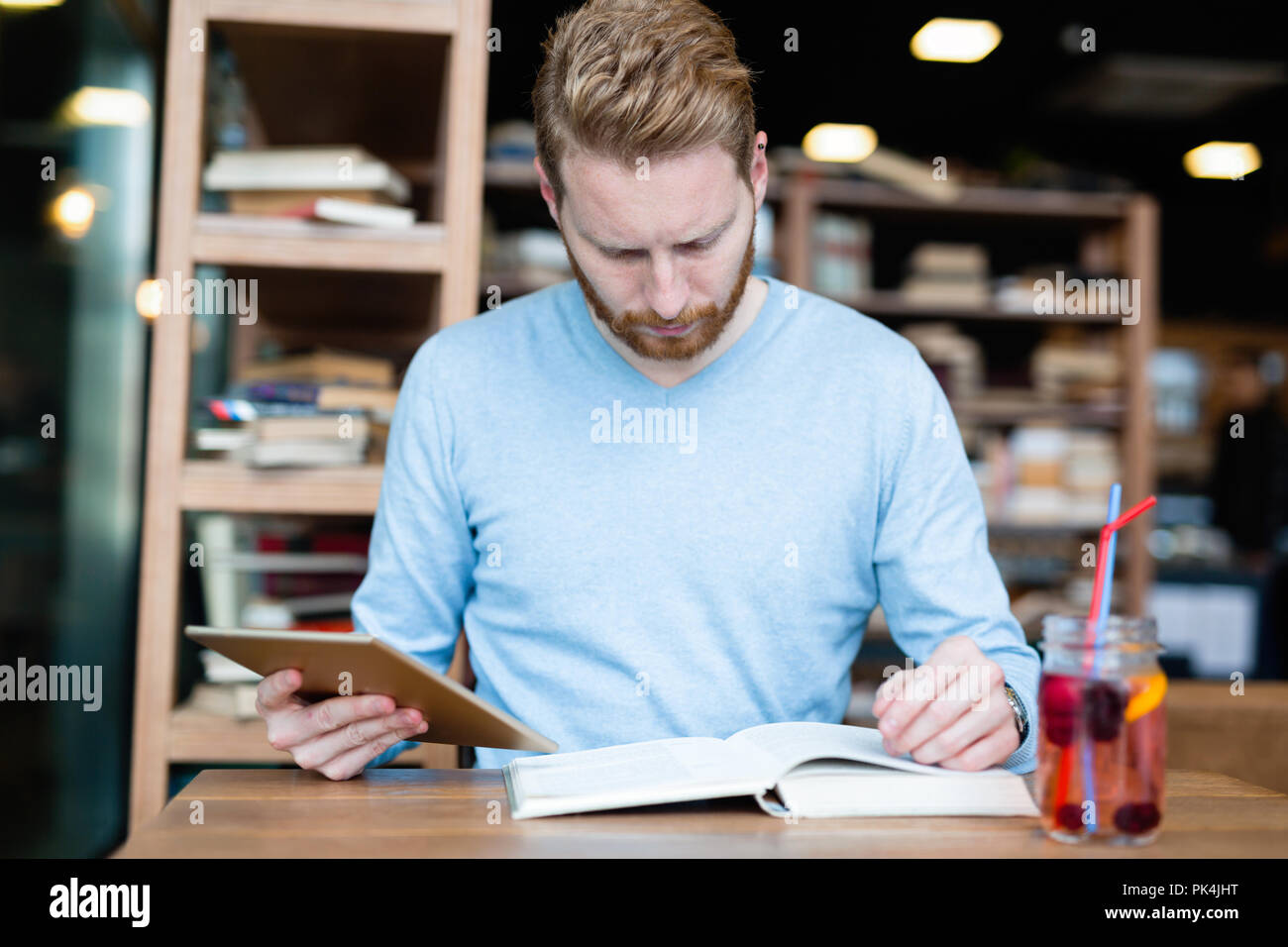 Reading in coffee hi-res stock photography and images - Alamy