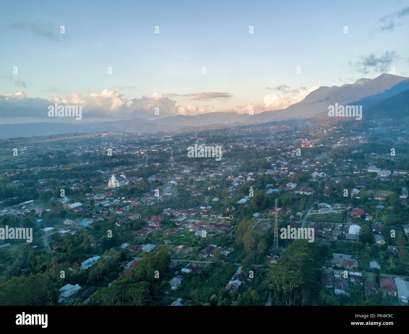 Aerial view of sunset in the town of Ruteng in Indonesia Stock Photo ...