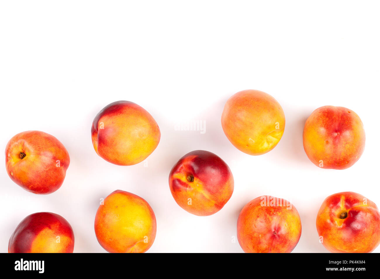 ripe nectarine with leaves isolated on white background with copy space ...