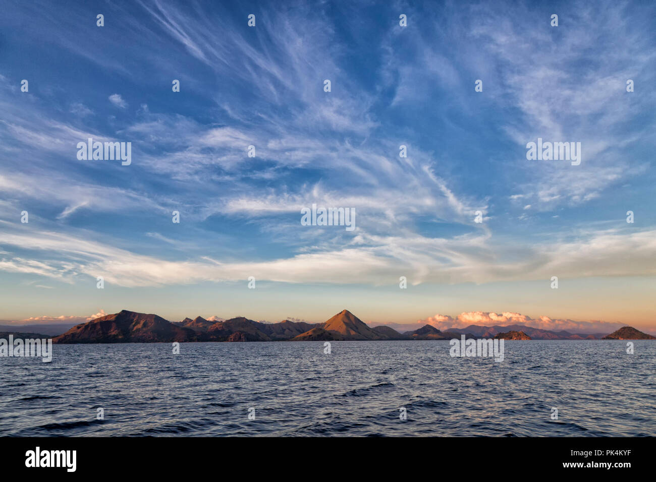 Early morning clouds over Rinca Island in the Komodo National Park ...