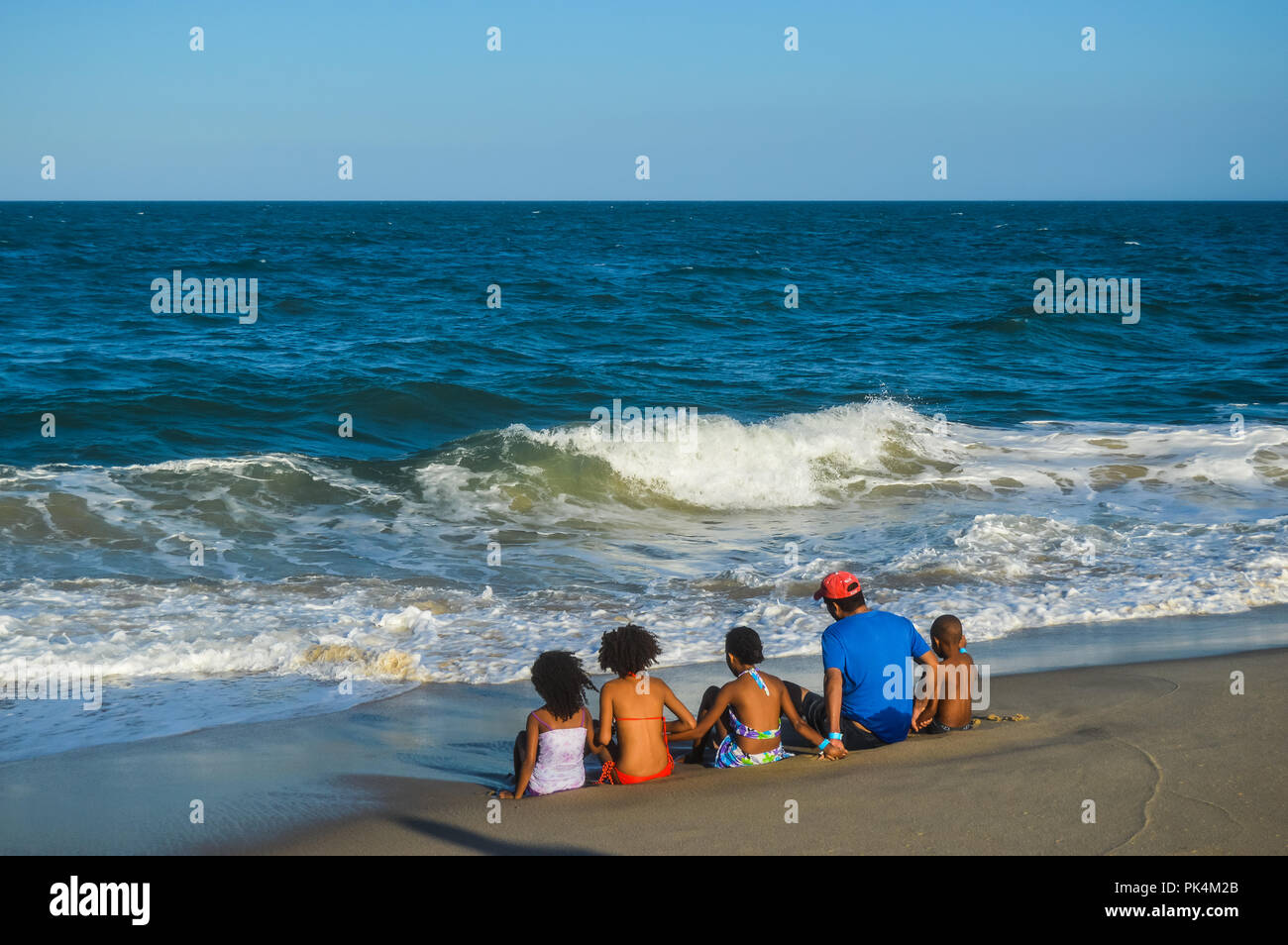 A Family enjoying and Playing at Macaneta beach , Mozambique Stock ...