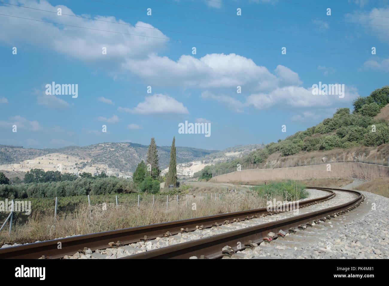 railway running to mountain Stock Photo - Alamy