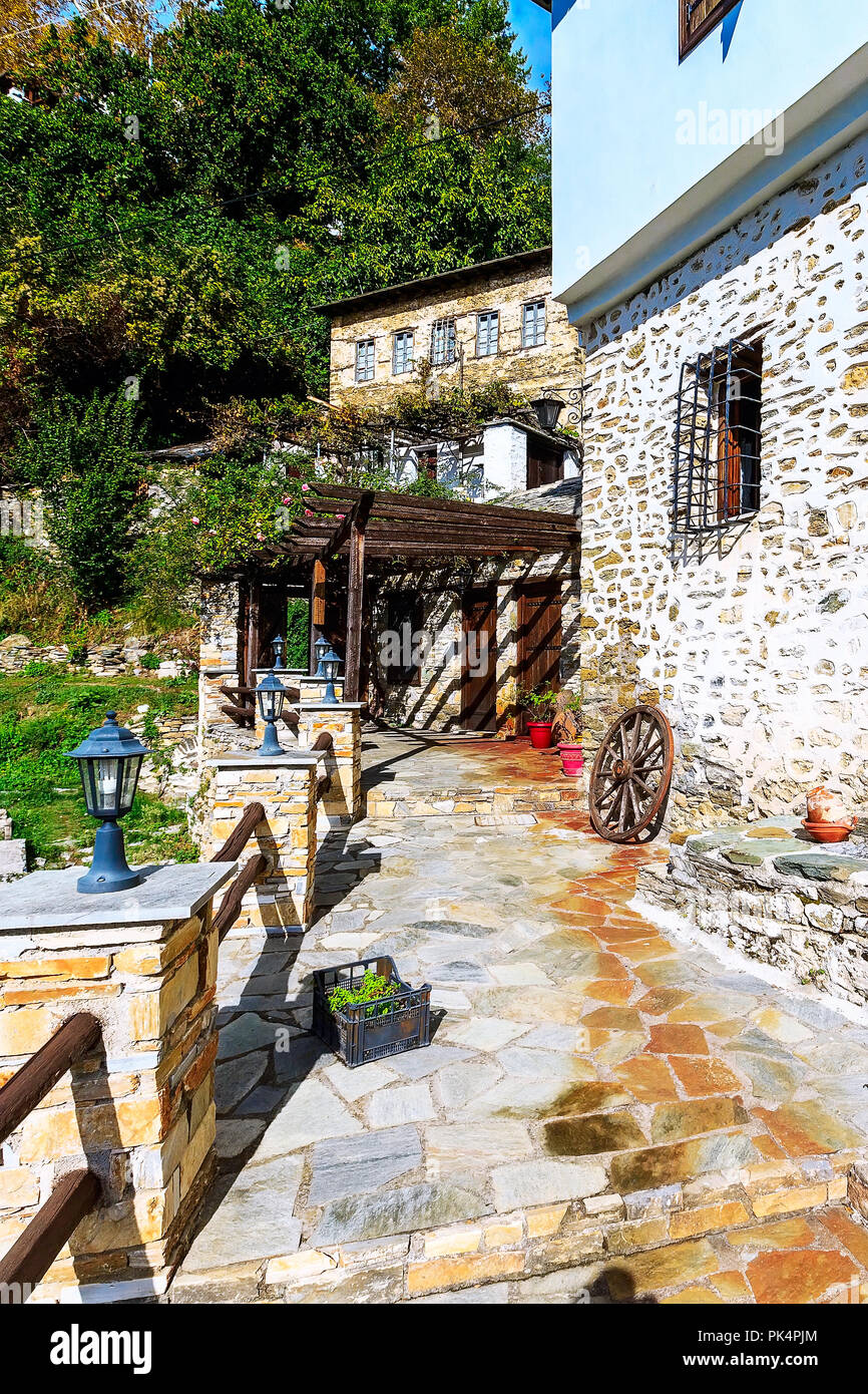 Street and typical greek rural house wall view at Makrinitsa village of ...