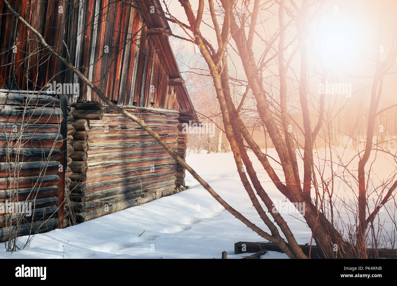 sunny landscape winter log house wal Stock Photo - Alamy