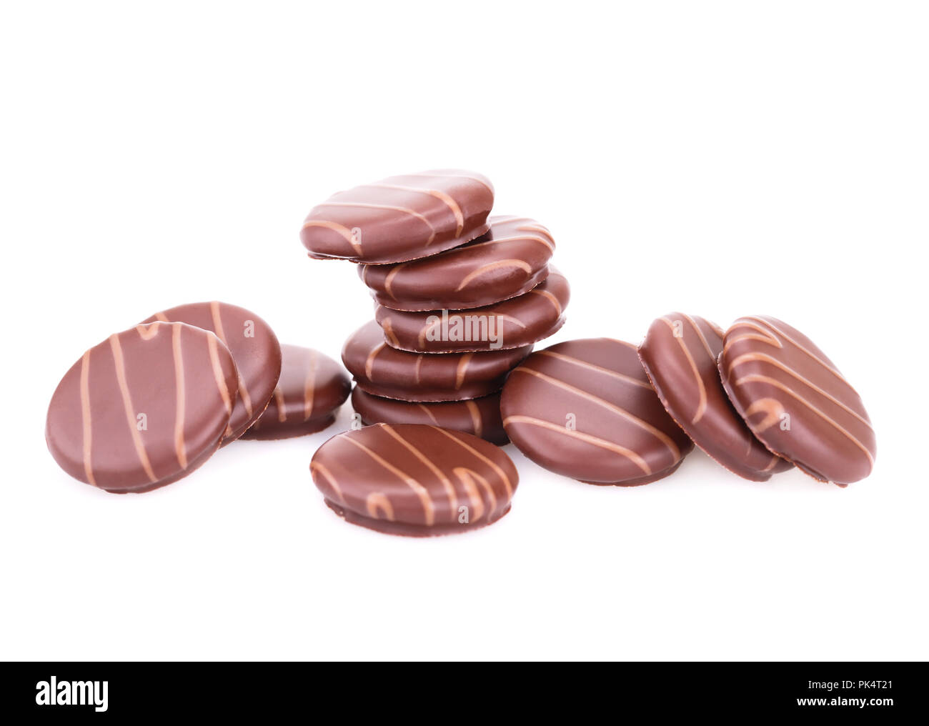 Heap of chocolate cookies isolated on white background Stock Photo - Alamy
