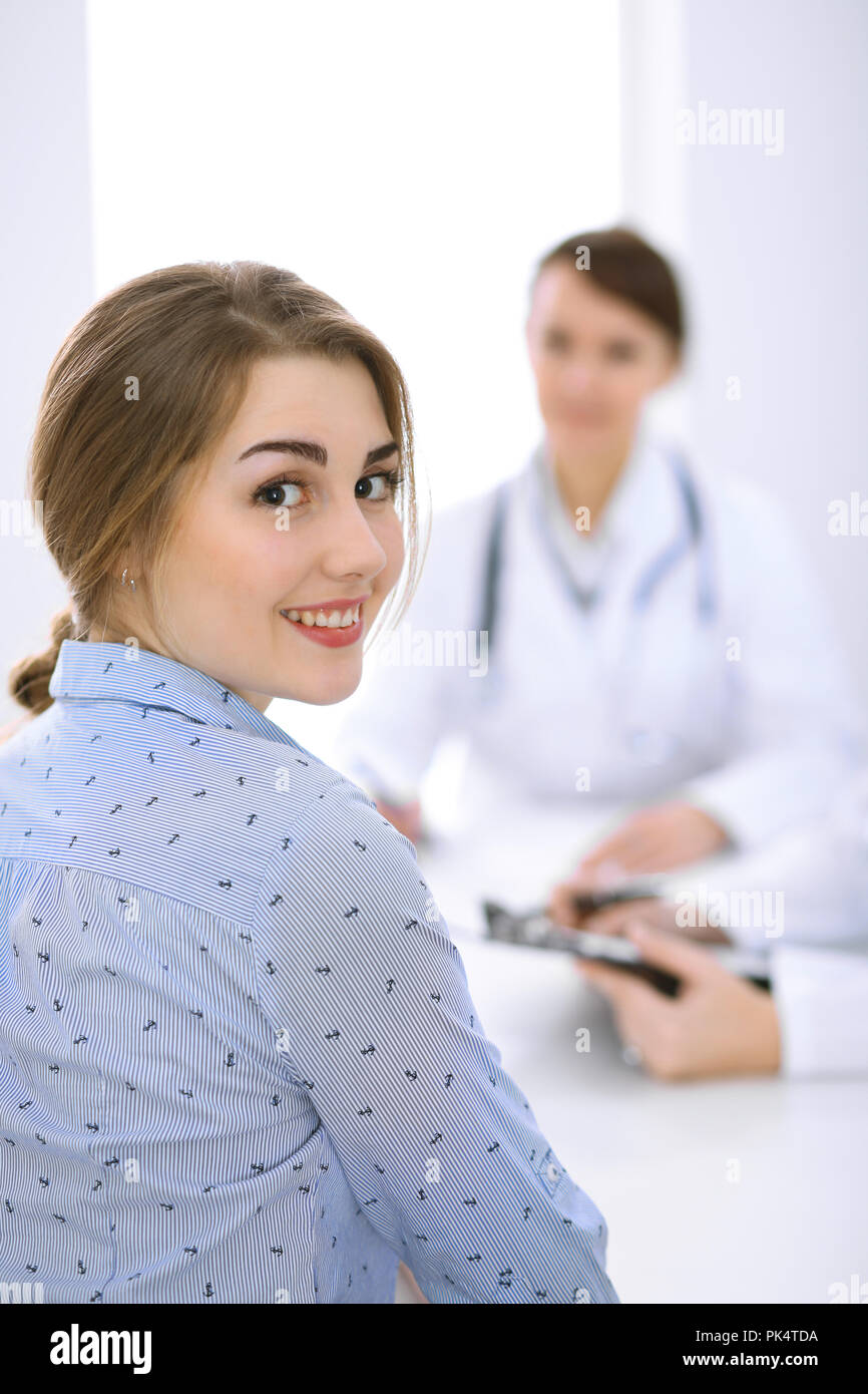 Doctor and patient at meeting. Medicine and health care concept Stock ...