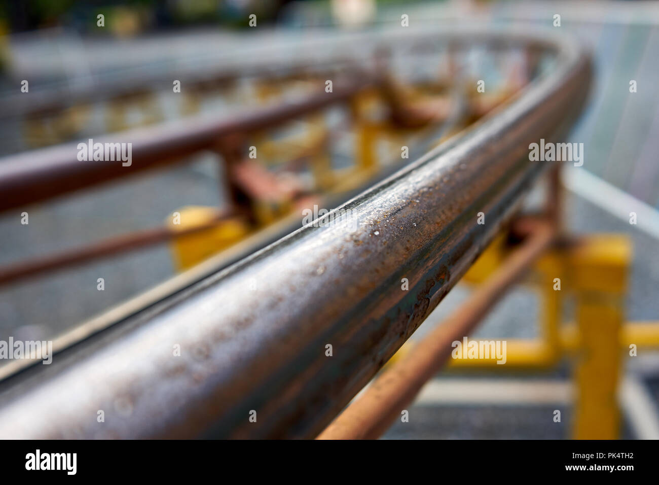 Detail Of a Curvy And Rusty Roller Coaster Rail Stock Photo - Alamy