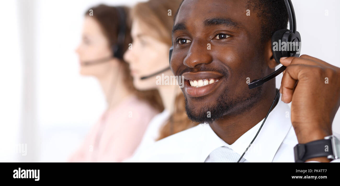 African american call operator in headset. Call center business or ...